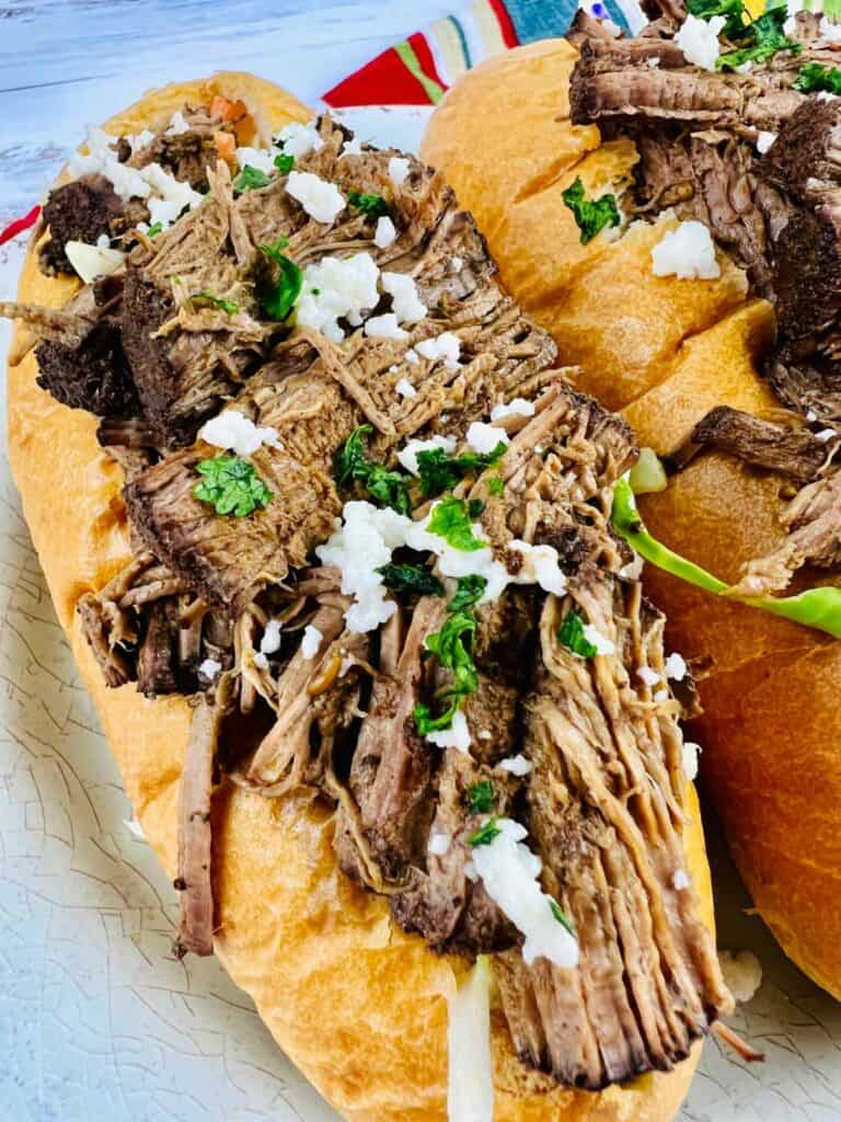 Crockpot Mexican Shredded Beef Tortas | Smells Like Delish